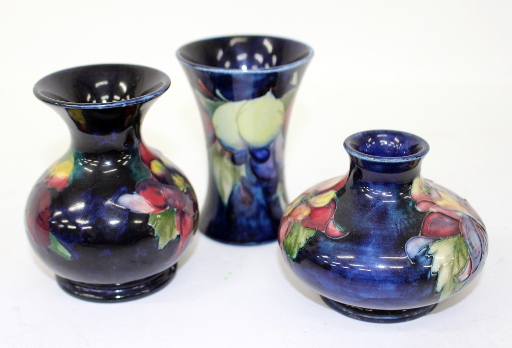 Lot 500 - A GROUP OF THREE SMALL BLUE GROUND MOORCROFT