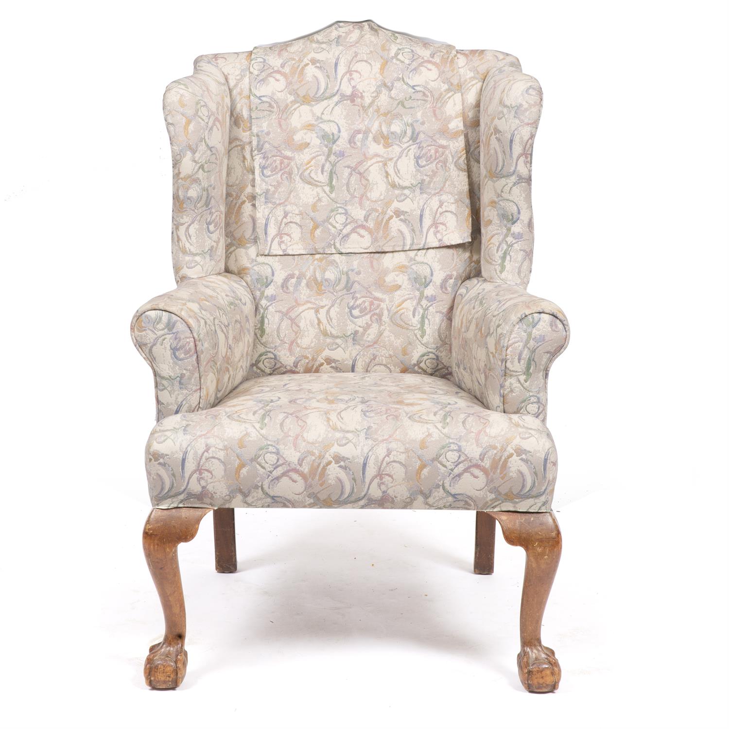 Lot 658 - A GEORGIAN STYLE UPHOLSTERED WING BACK