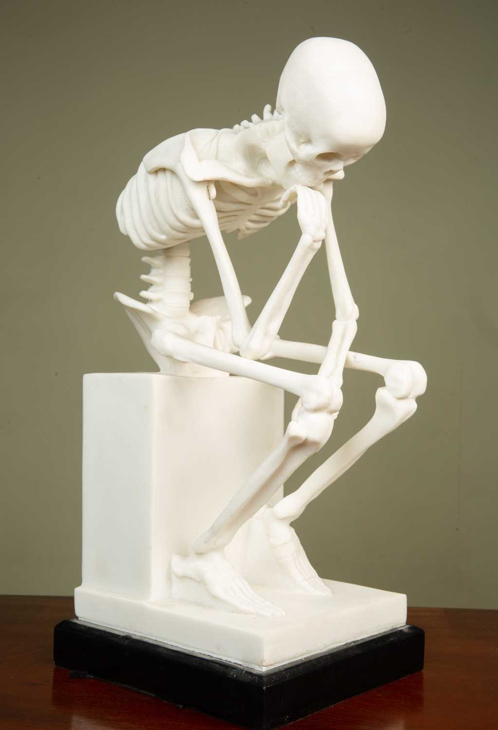 Lot 181 - A composite resin sculpture of a skeleton
