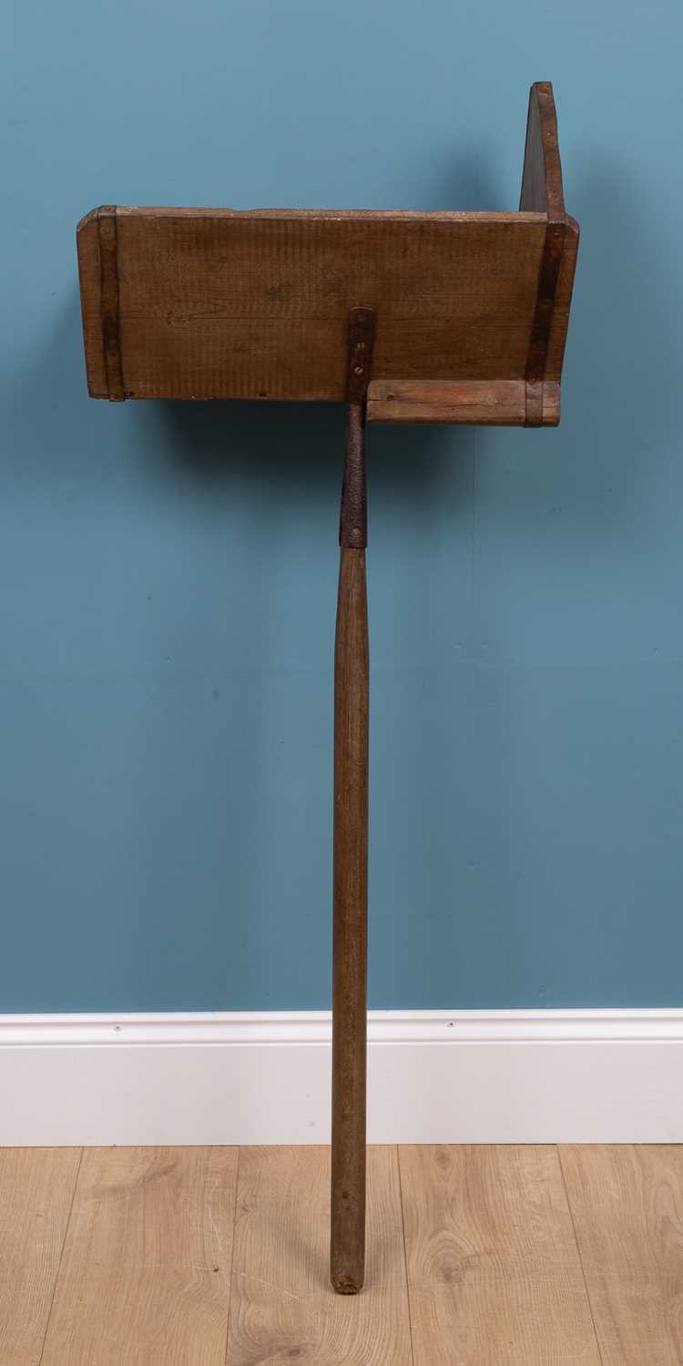 Lot 1206 - An antique wood and wrought iron