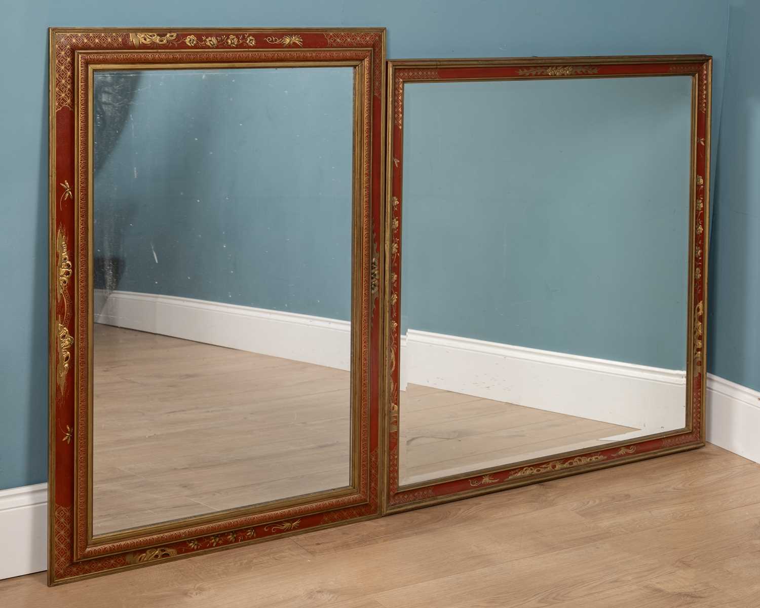 Lot 661 - Two mirrors with red lacquered frames and