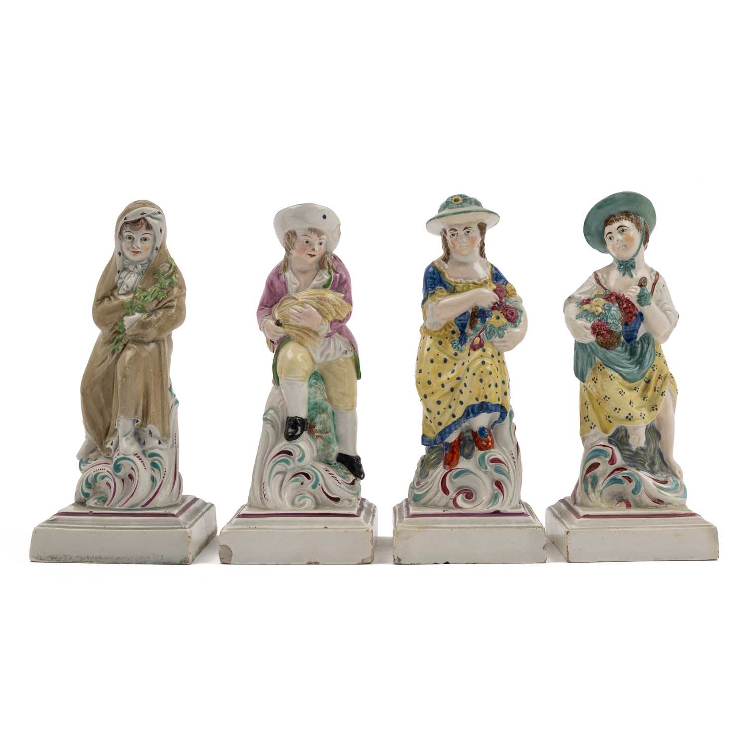 Lot 36 - A set of four 18th century pearlware figures,