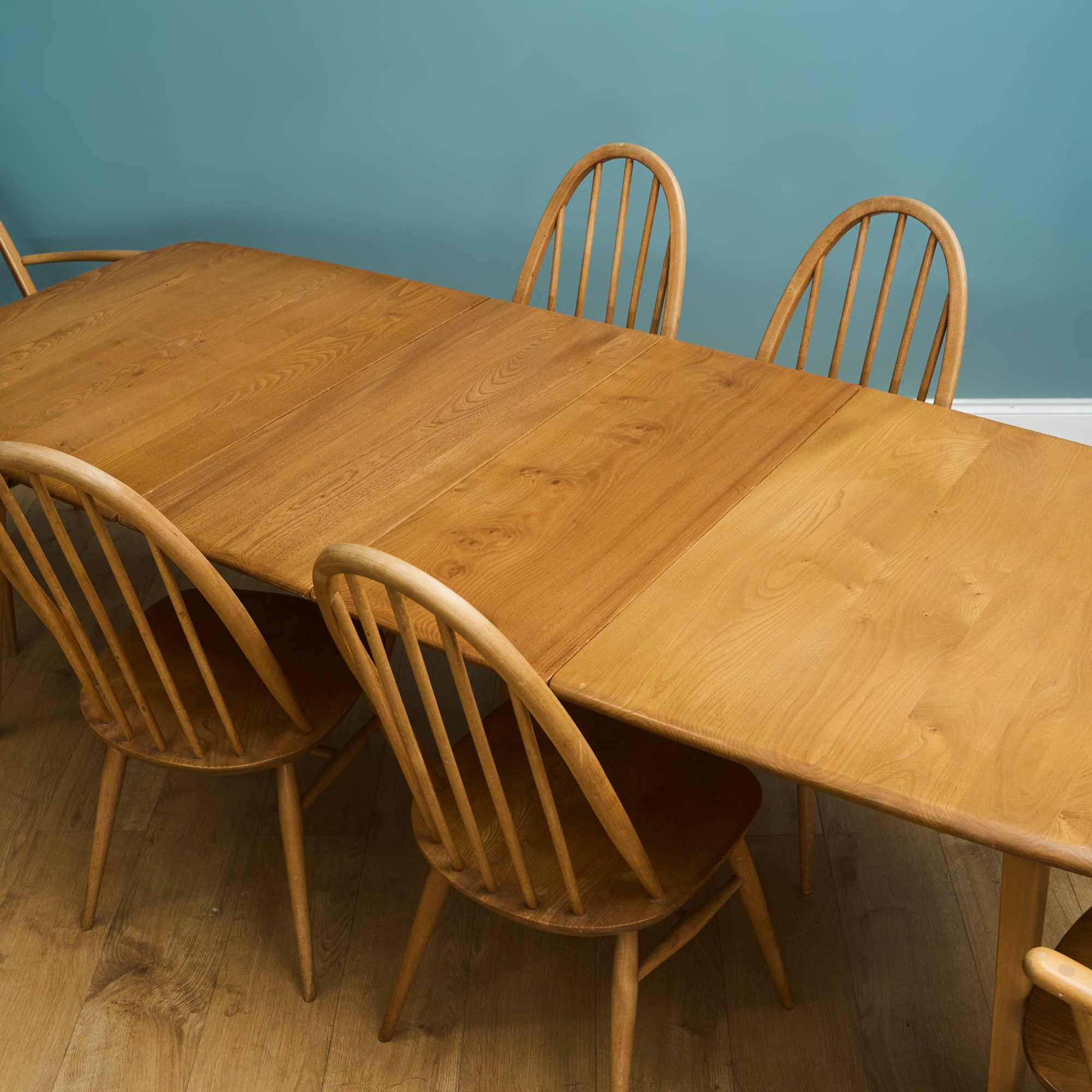 Lot 1169 - An Ercol dining table and chairs