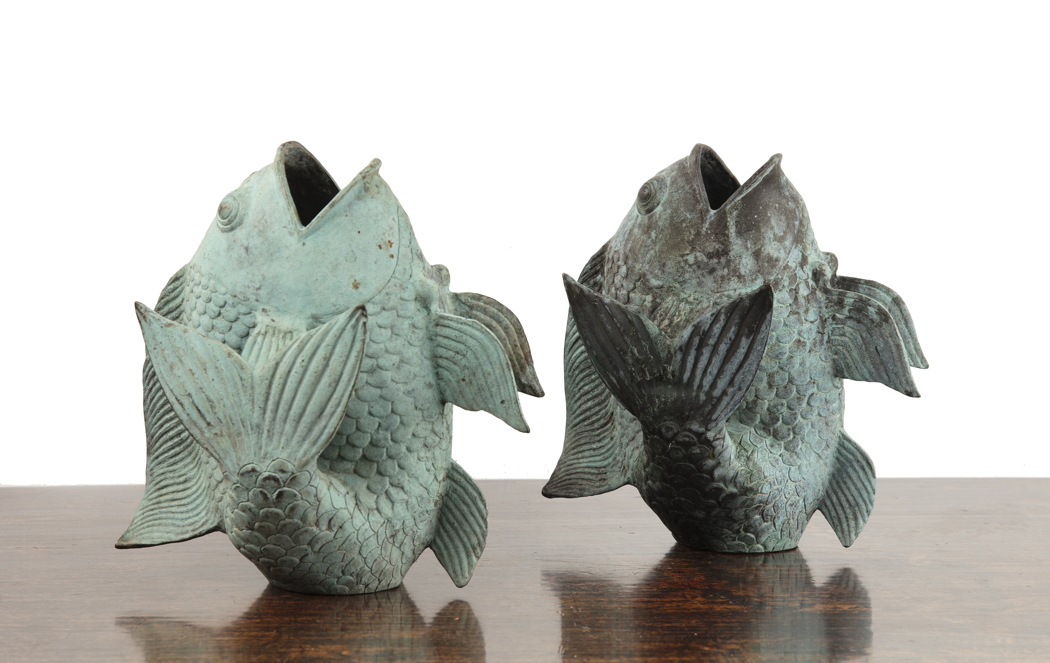 Lot 62 - Pair of bronze model koi fishes depicted with
