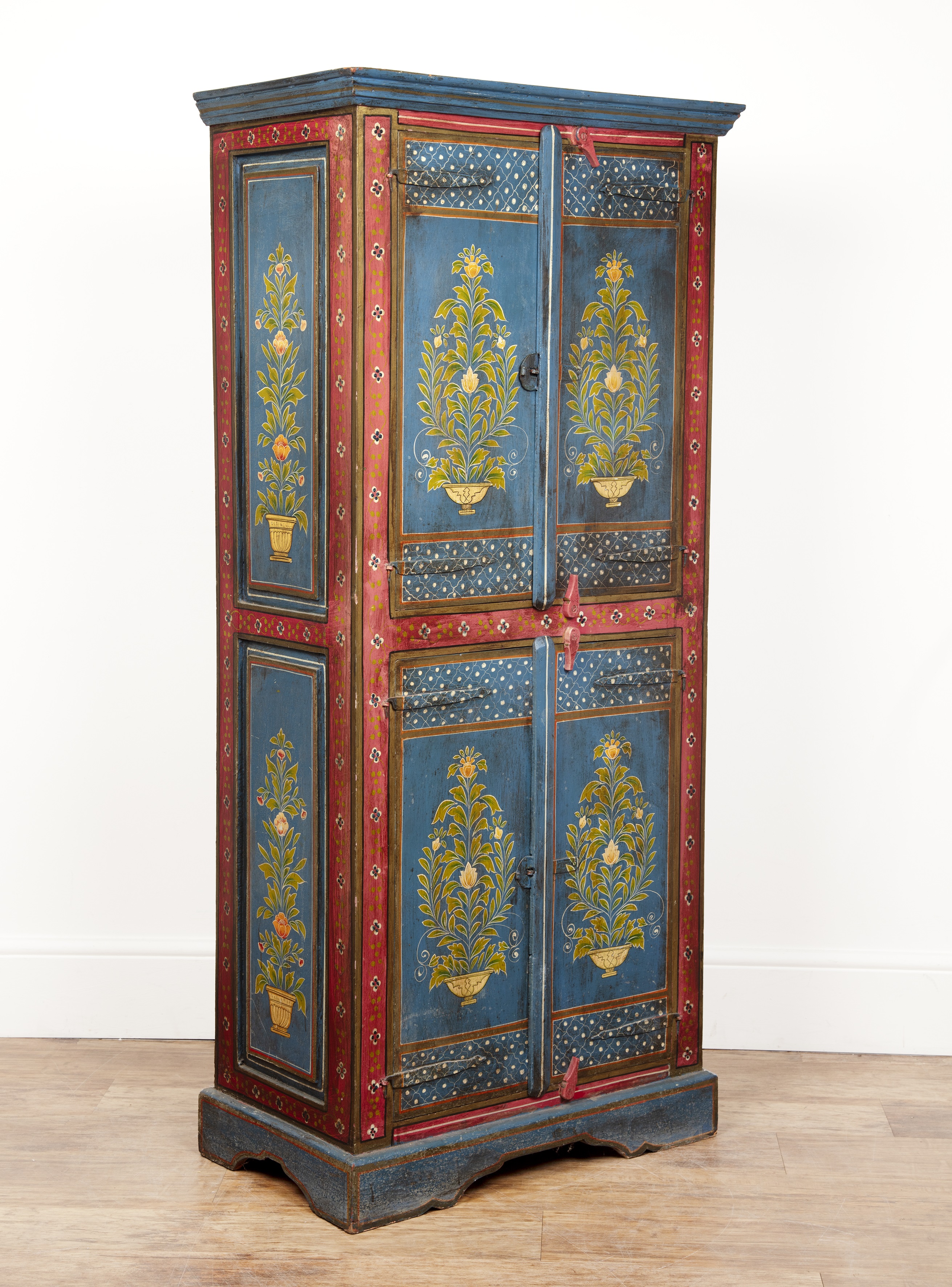 Small painted wooden cupboard with polychrome Indian