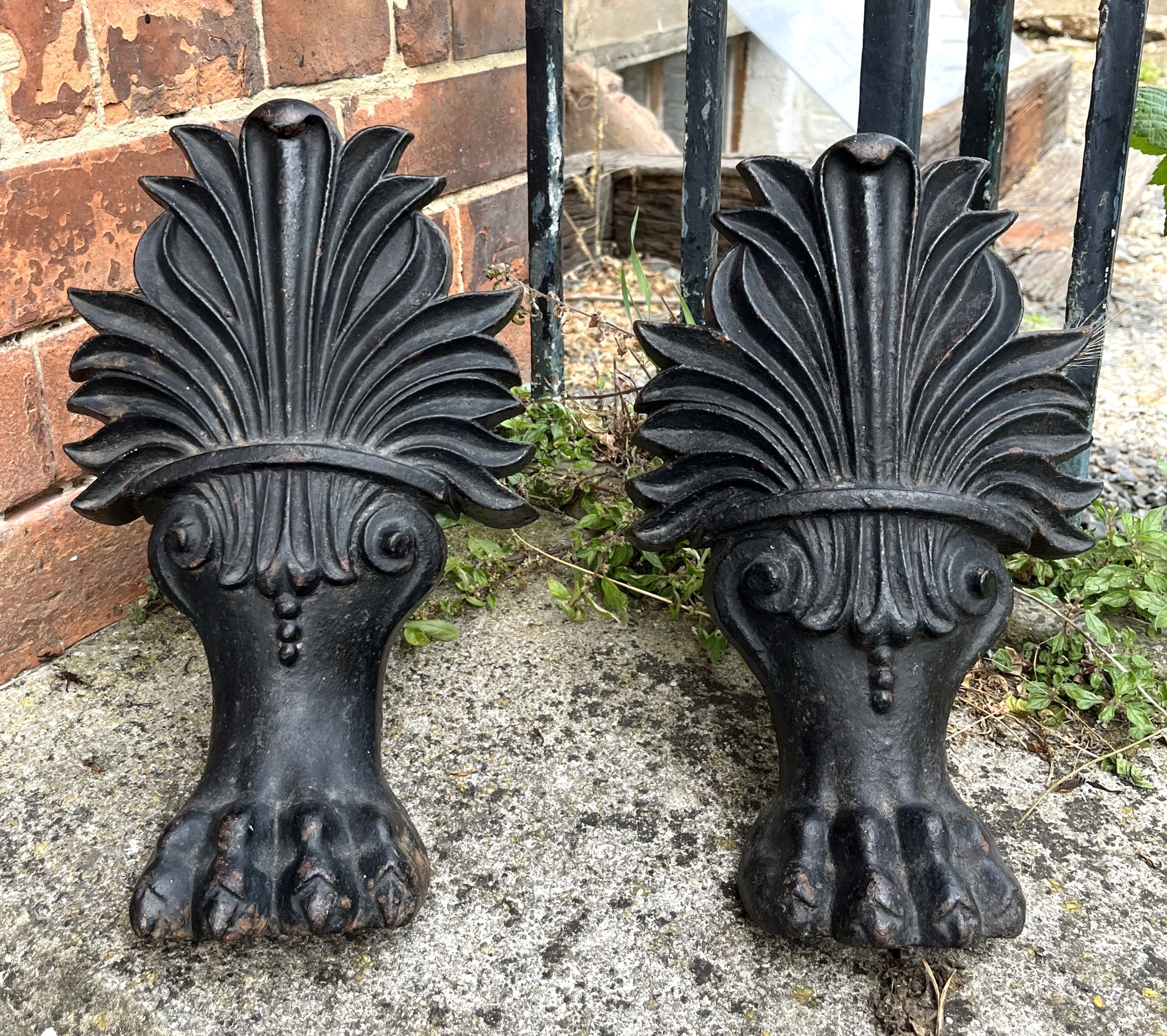 Lot 332 - Pair of cast iron fire dogs Regency, of