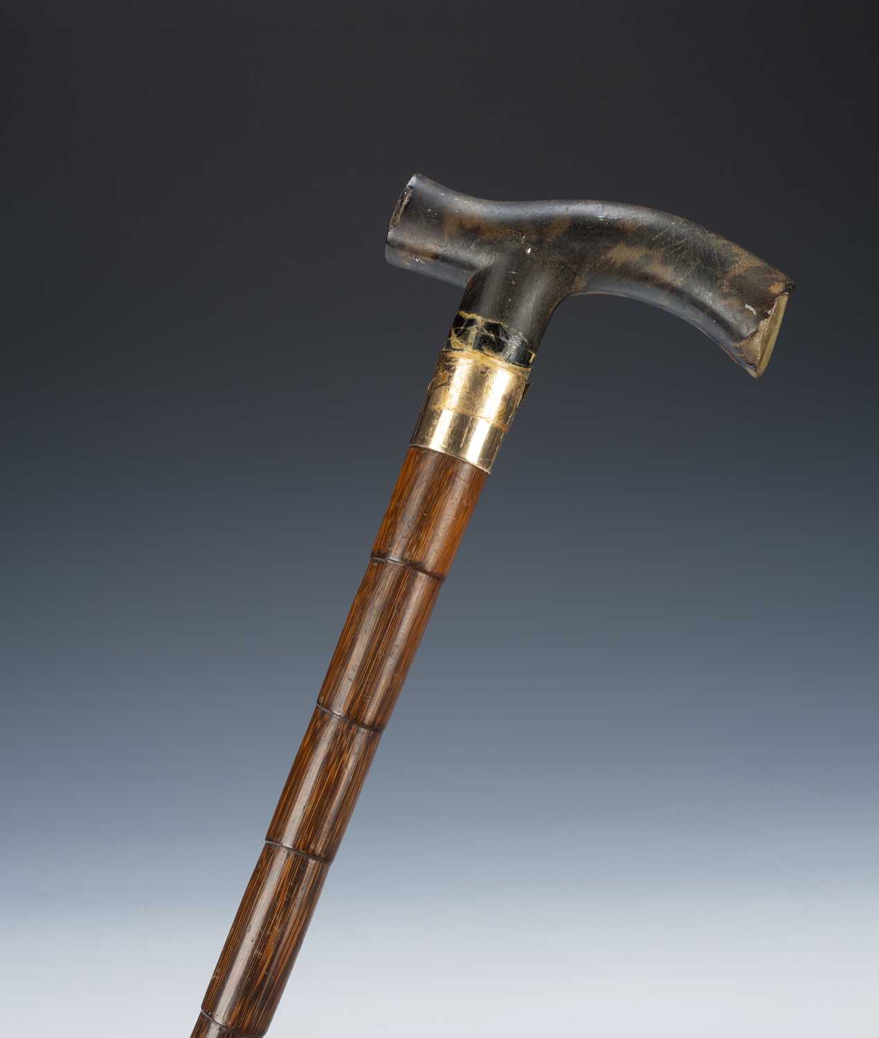 Lot 316 - Victorian walking cane with 9ct gold collar