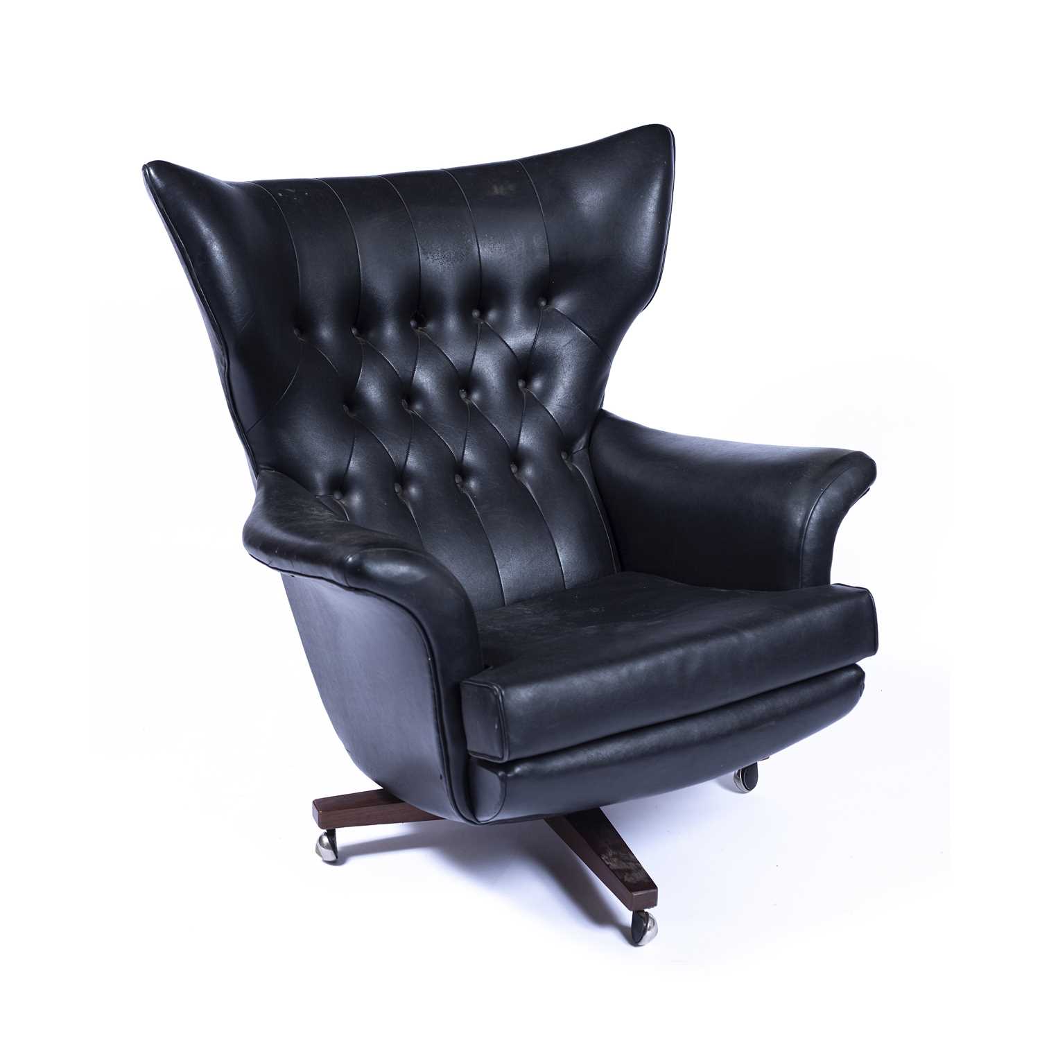 Lot 88 - G plan Black swivel chair, mid 20th Century,