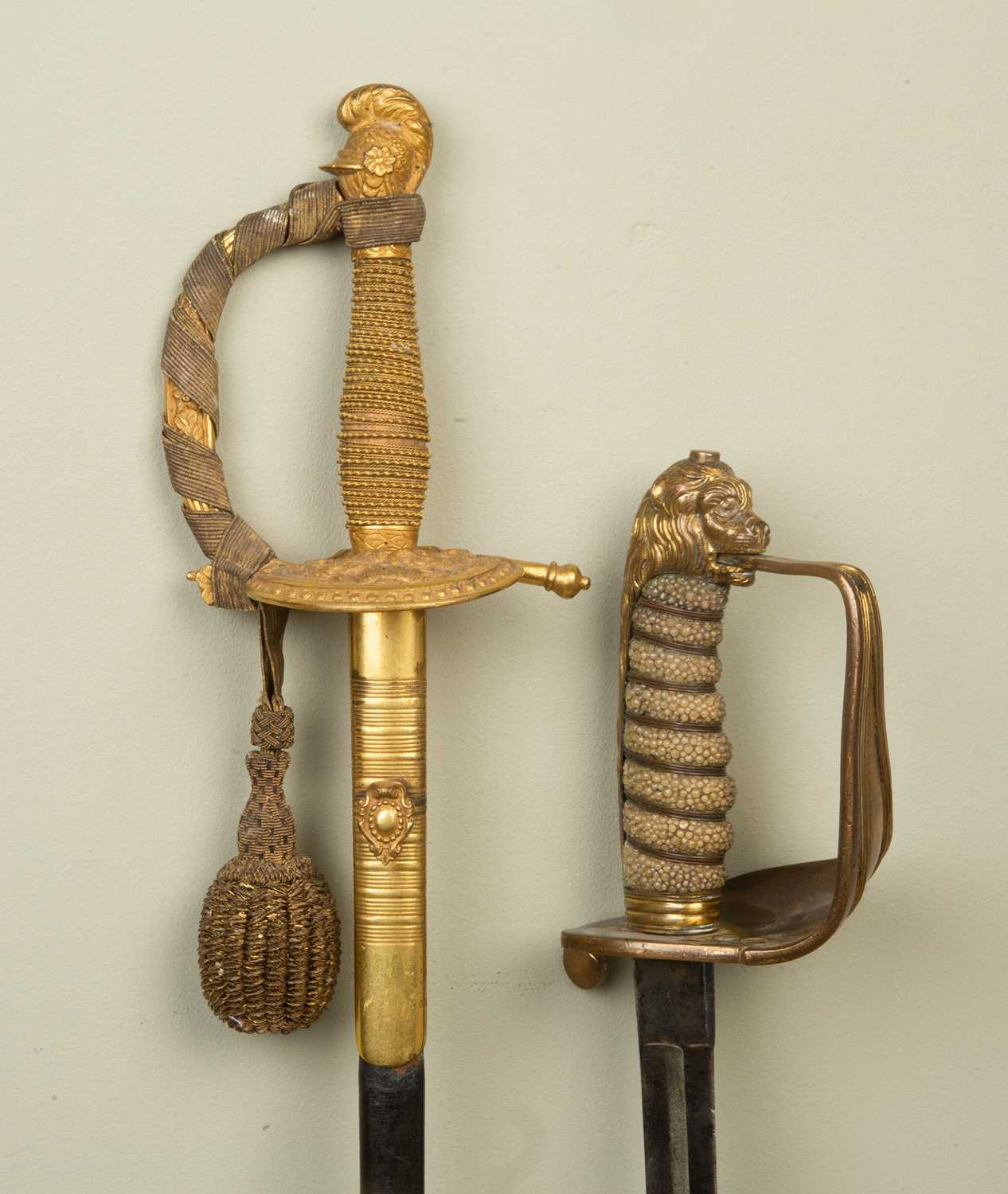 Lot 164 - Two swords; one presentation sword, stamped